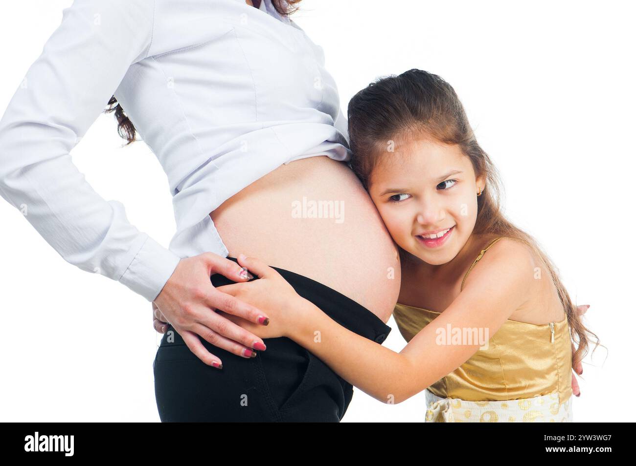 cute little girl hugging belly pregnant mom Stock Photo - Alamy