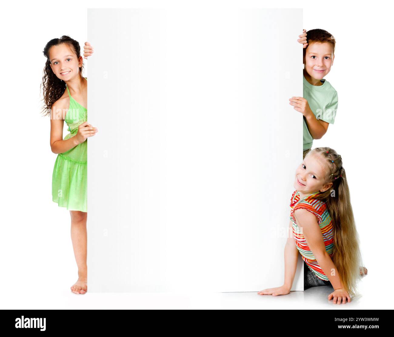 Beautiful children with big white banner Stock Photo - Alamy