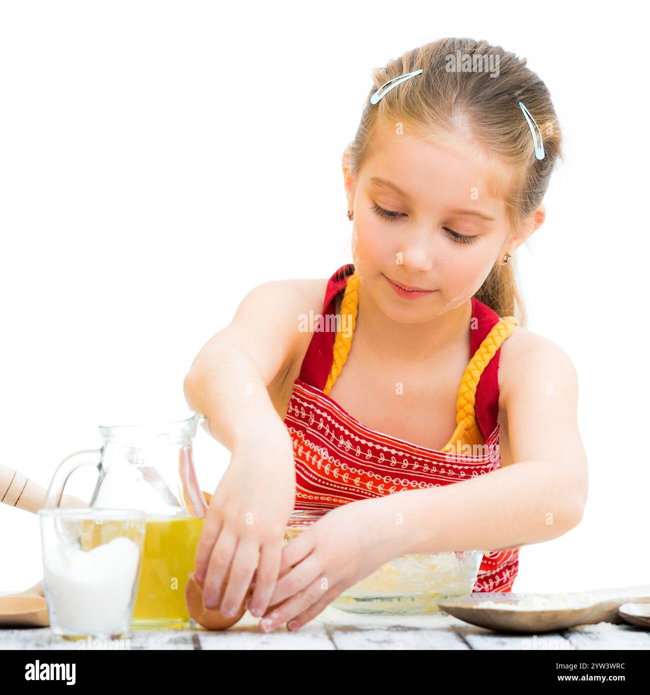 cute llittle girl cooking isolated on a white background Stock Photo ...