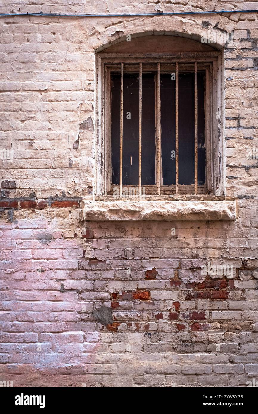 Old barred window and decaying brick work Stock Photo - Alamy