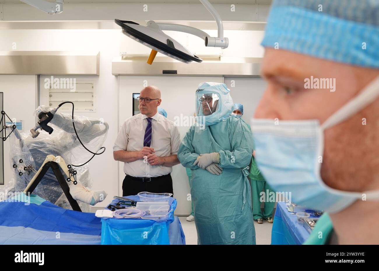 First Minister John Swinney alongside Chris Gee, Associate Medical ...