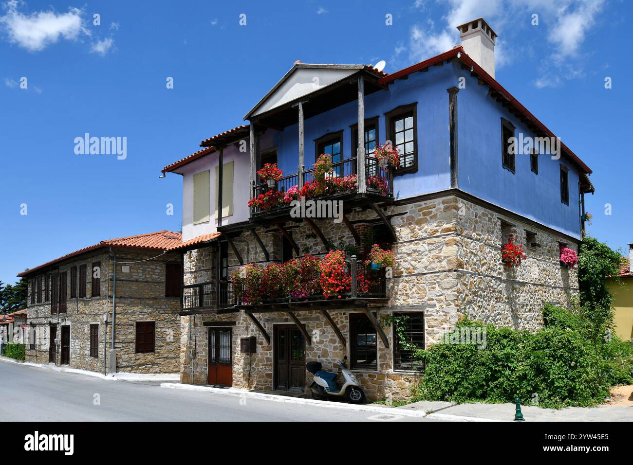 Arnea, Greece - June 15, 2024: Beautiful colorful houses with flowers ...