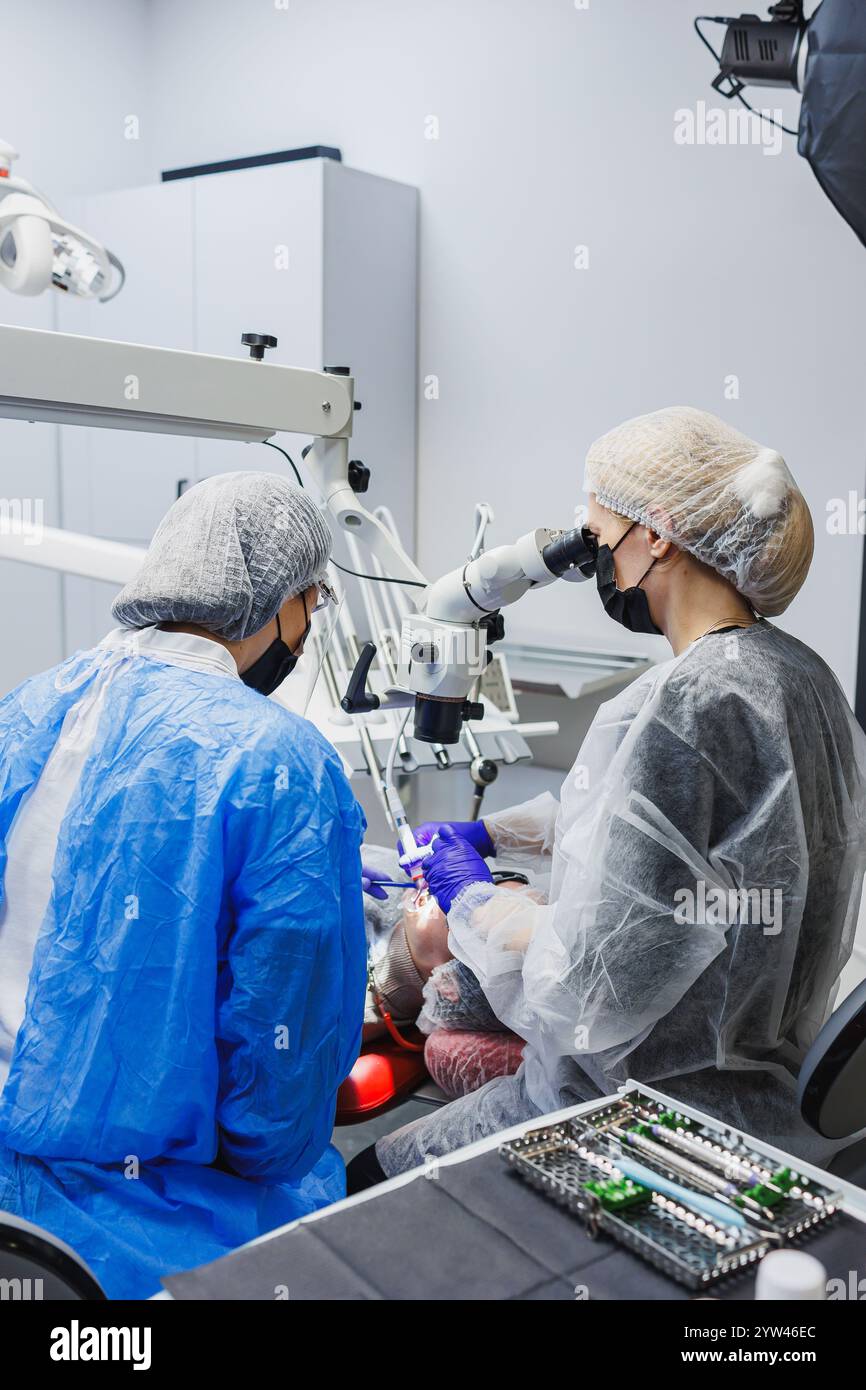 Modern dental equipment. Dental surgery using dental equipment. Dental ...