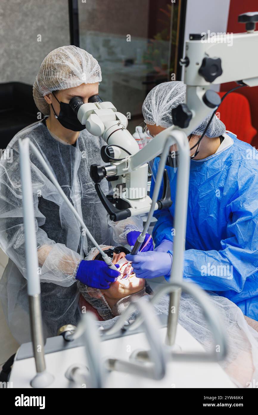 Modern dental equipment. Dental surgery using dental equipment. Dental ...