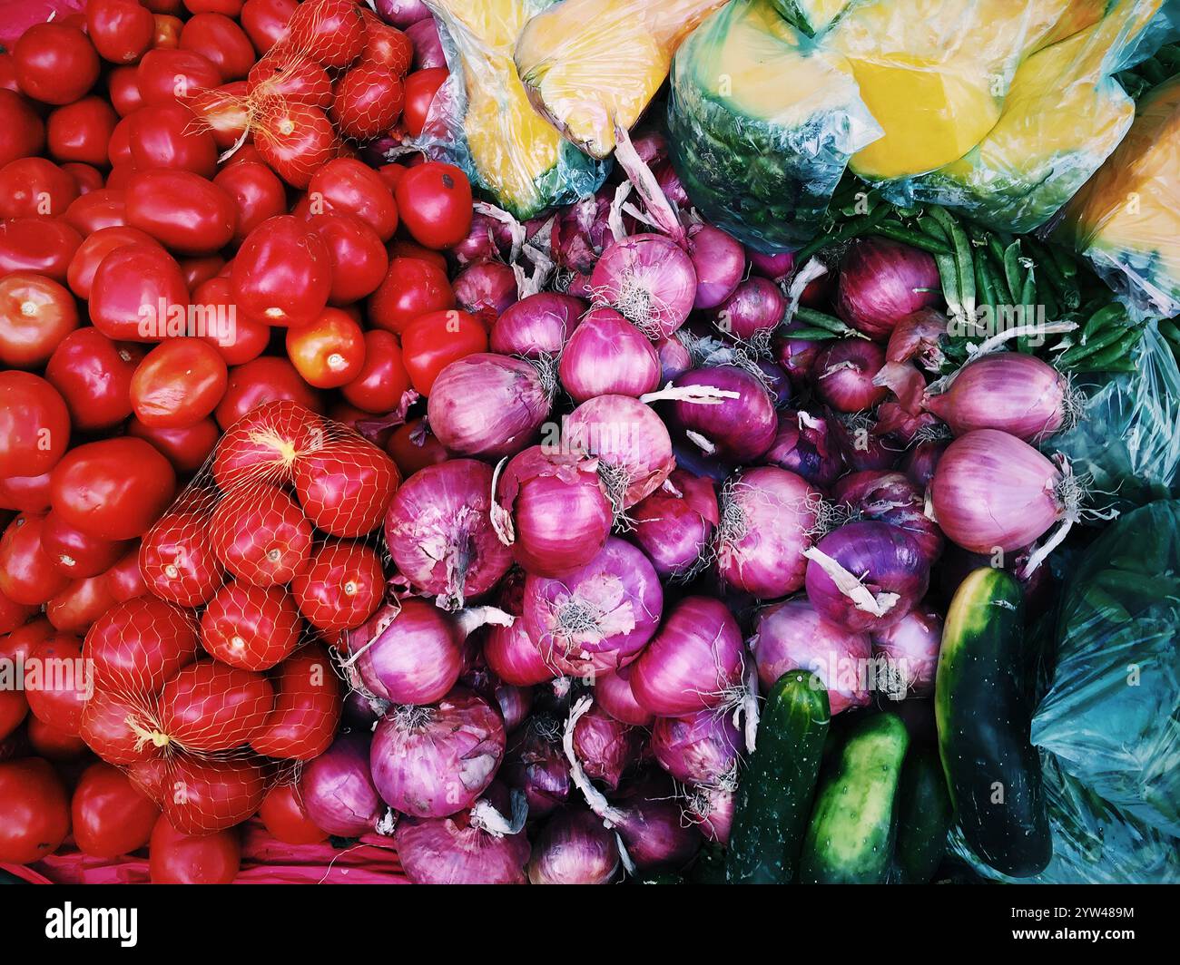 Fruit and vegetable shelf in the market. Some are already packed some ...