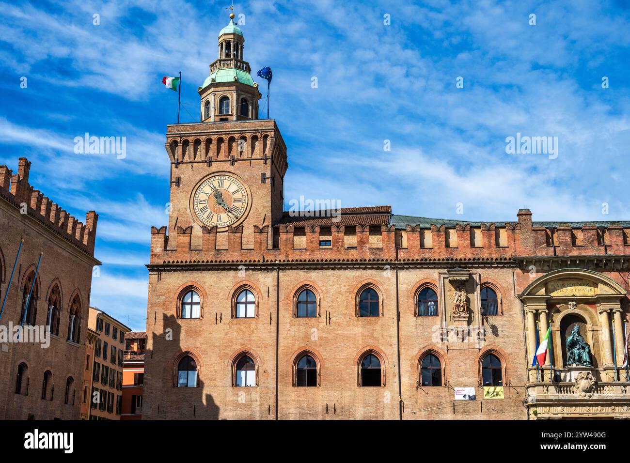 Palazzo d'Accursio and Torre dell'Orologio clock tower on Piazza Maggiore in historic city ...
