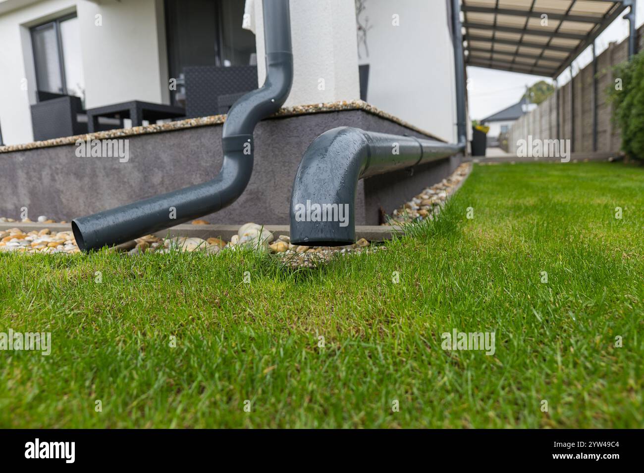 Rainwater flows from drainpipe water hi-res stock photography and ...