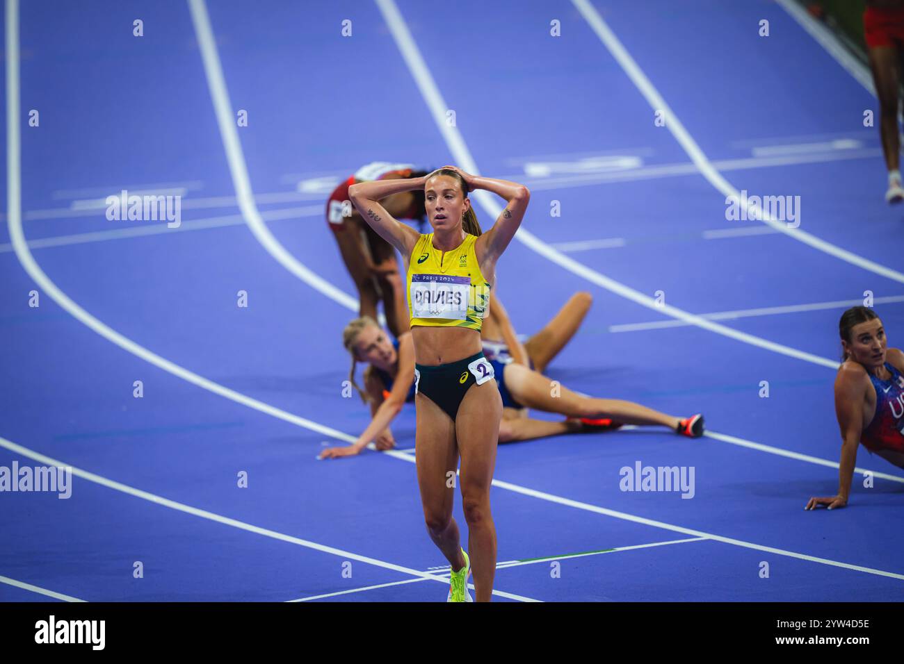 Rose Davies participating in the 5000 meters at the Paris 2024 Olympic ...