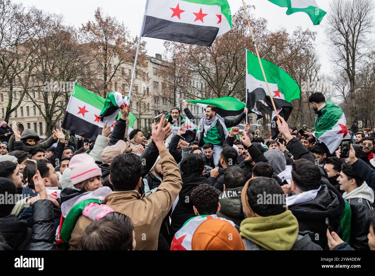 People wave Free Syrian Army flags during the celebration. Syrians ...