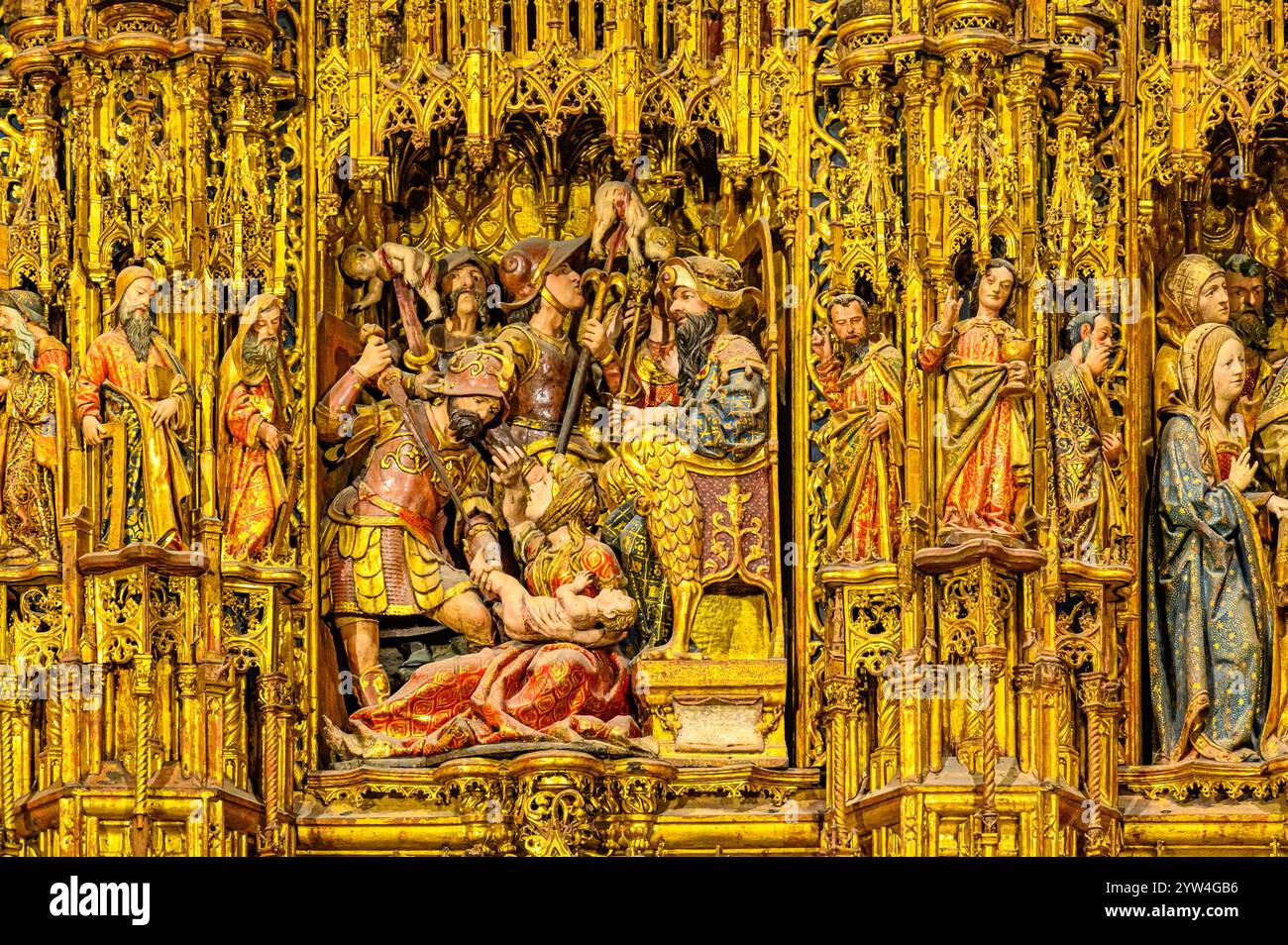 Seville, Spain, Intricacy of the main altar showing historic scenes and ...