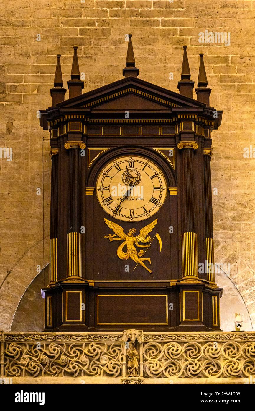 Seville, Spain, An ancient clock inside the building Stock Photo - Alamy