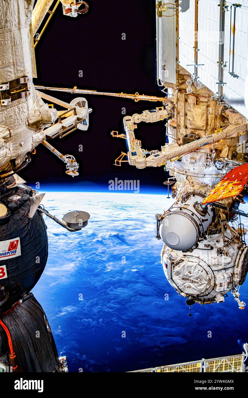 Planet Earth framed in the fuselage of the ISS. Digital enhancement of ...