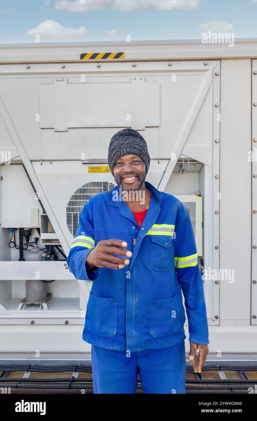 portrait of single african man worker industrial setting outdoors in ...