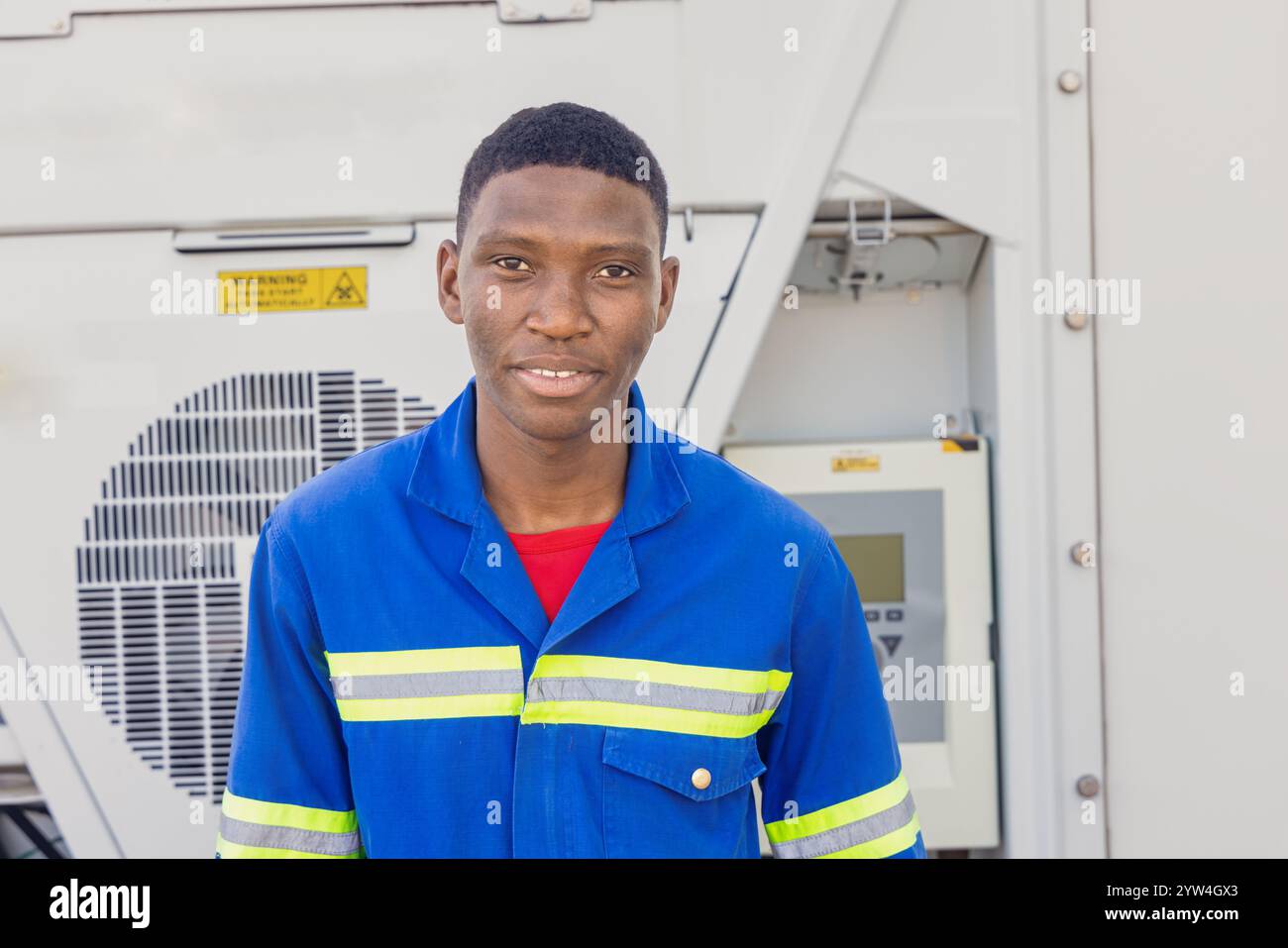 portrait of single african man worker industrial setting outdoors in ...