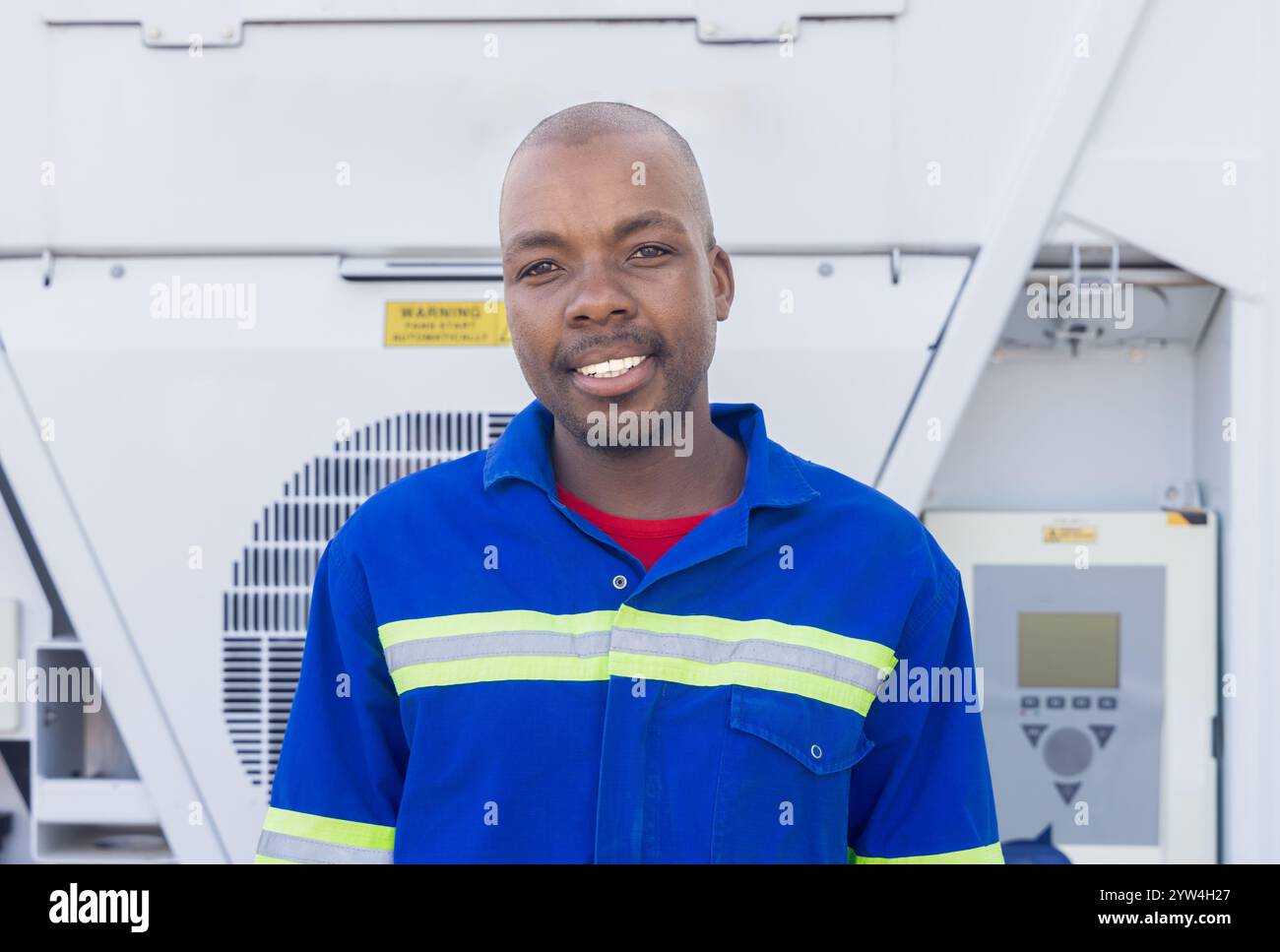 portrait of single african man worker industrial setting outdoors in ...