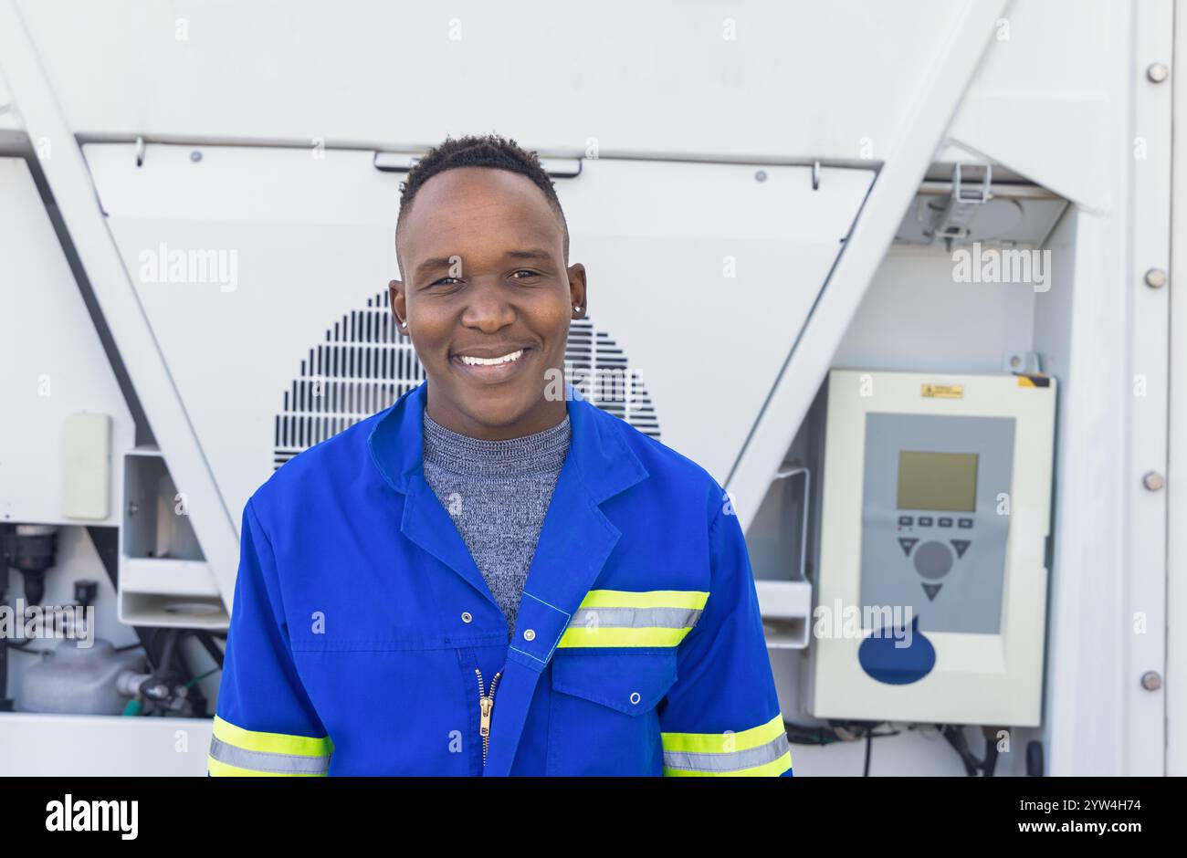 portrait of single african man worker industrial setting outdoors in ...