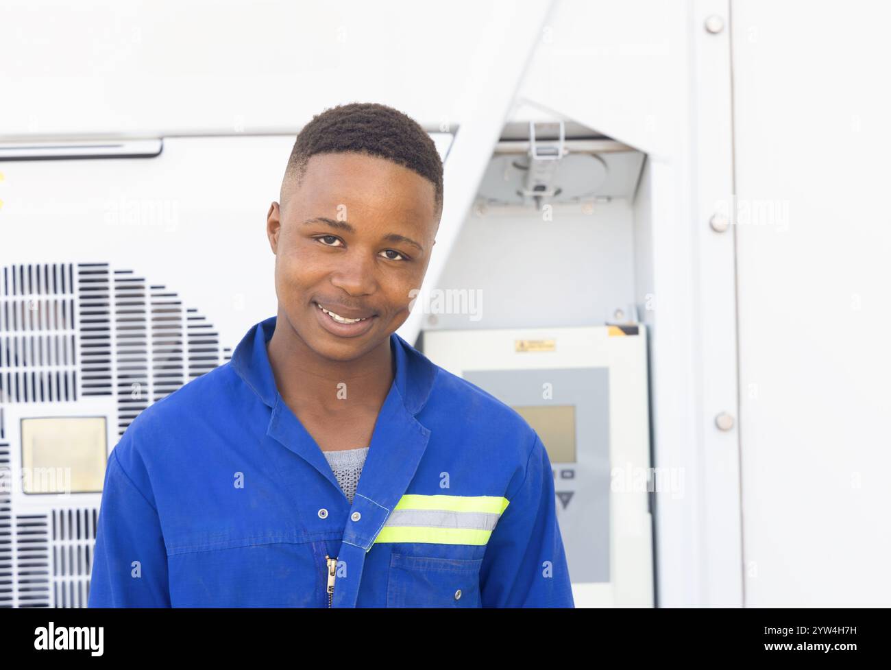 portrait of single african man worker industrial setting outdoors in ...