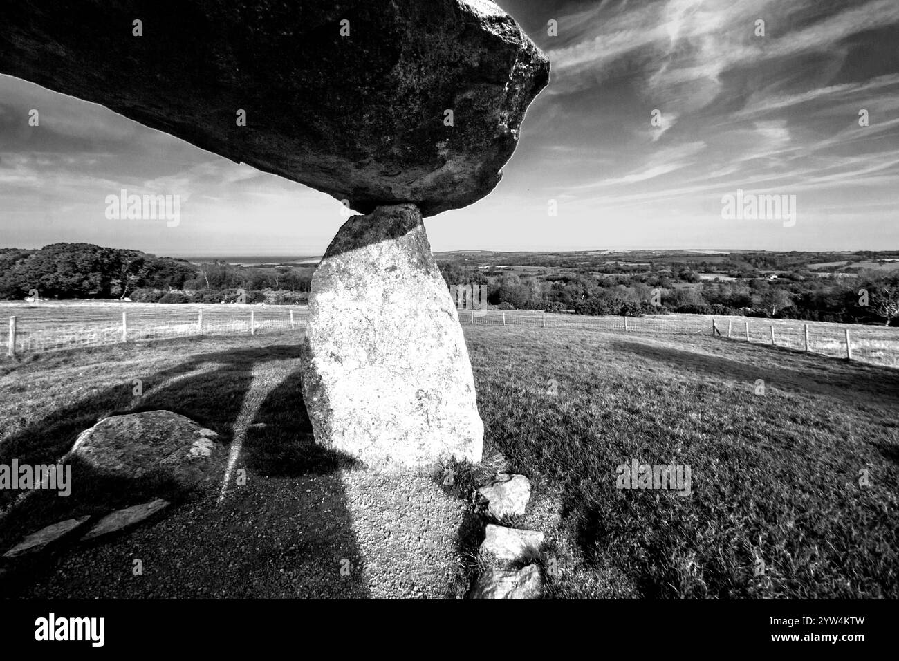 Black and white view of beneath the impressive neolithic dolmen of ...
