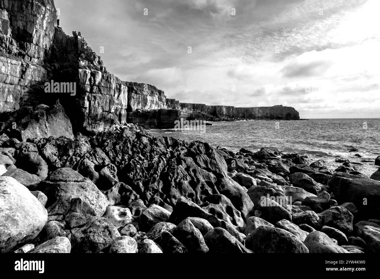 Dramatic view in black and white of the steep limestone cliffs along ...