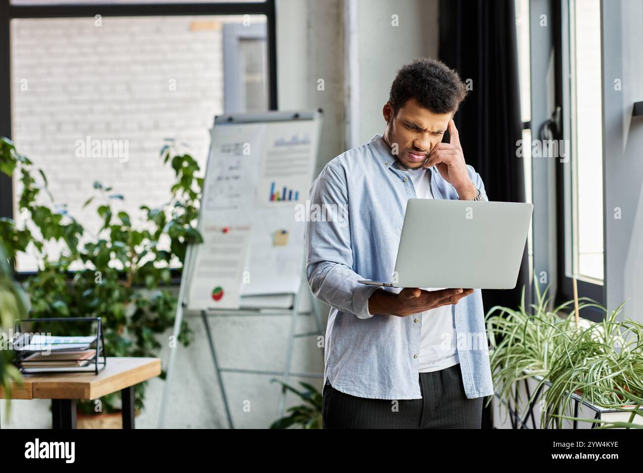 Focused individual laptop stands hi-res stock photography and images ...
