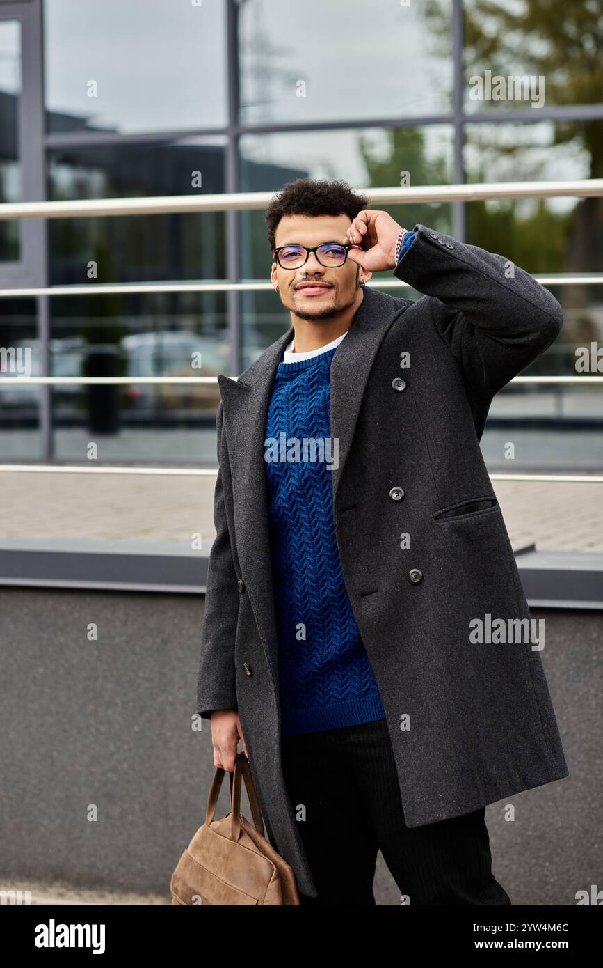 Young man confidently poses outdoors hi-res stock photography and ...