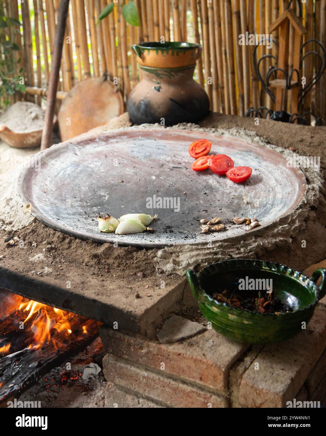 Tomato, onion and Mexican garlic. The ingredients are cooked on a ...