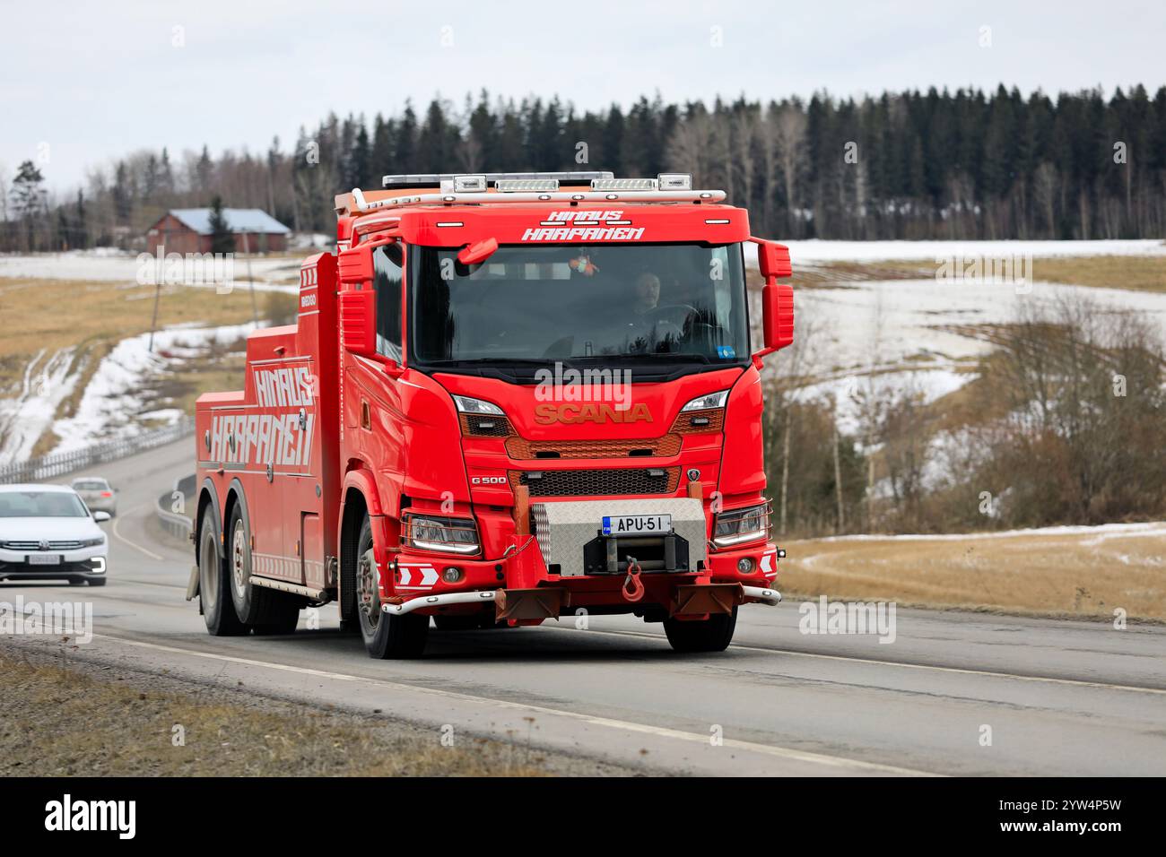 Red Scania G500 heavy duty recovery vehicle on road in South of Finland ...