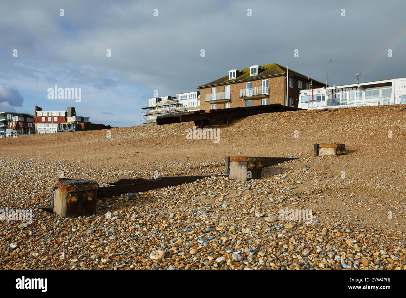 Hythe beach, Kent, UK, showing the extent of shingle erosion during the ...