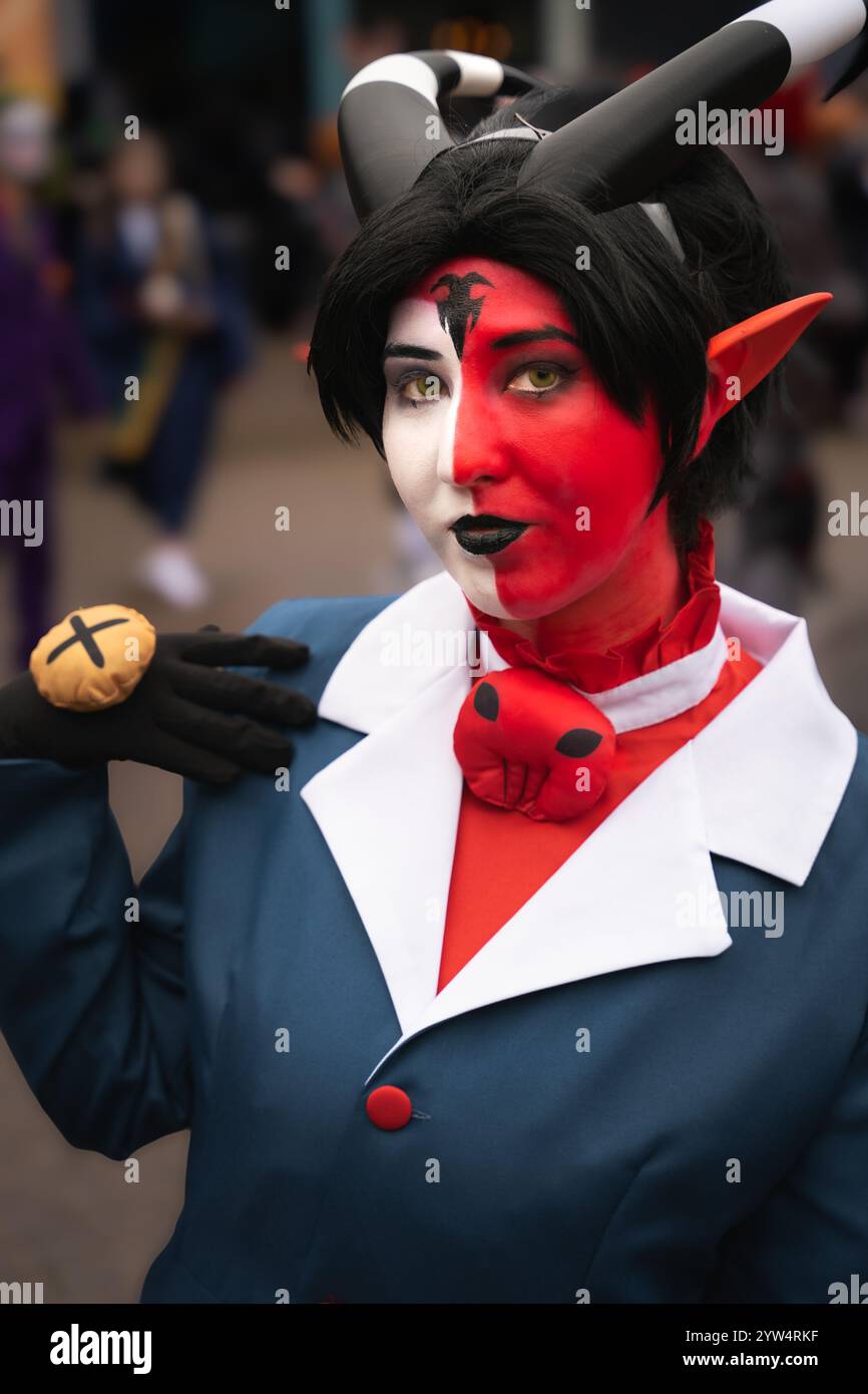 A close up portrait of a pretty female cosplayer dressed as an Anime ...