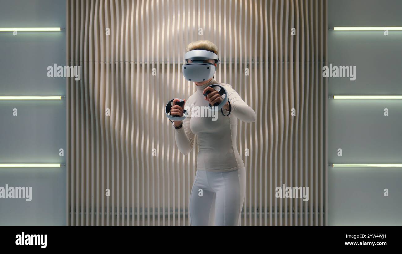 Futuristic neon studio woman explore AR gadget high-tech wear VR ...