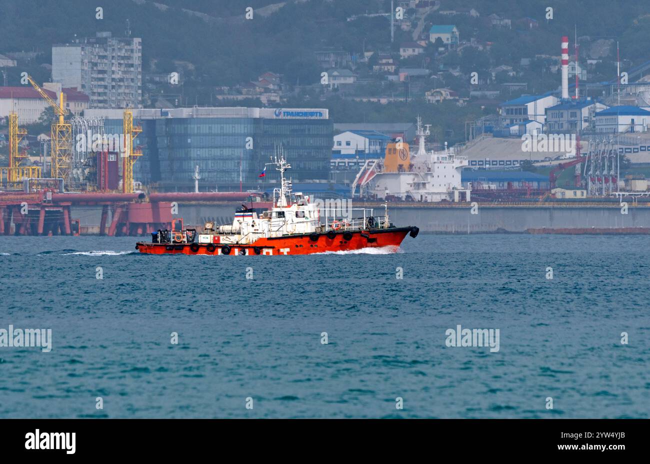 Novorossiysk, Russia - 18 August 2023. red port ship name Captain ...