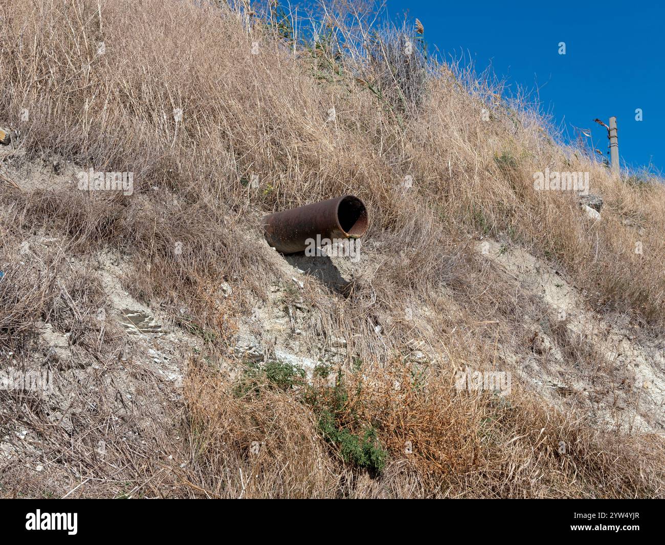 Dirty sewage from the pipe, environmental pollution Stock Photo - Alamy