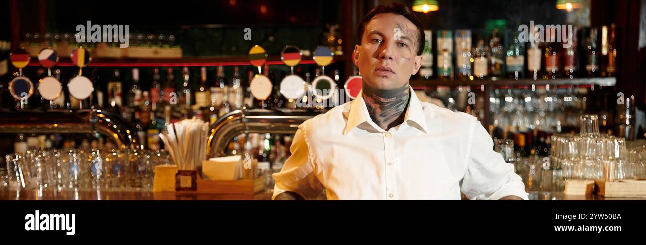A stylish young man with tattoos relaxes in a bustling bar during an ...
