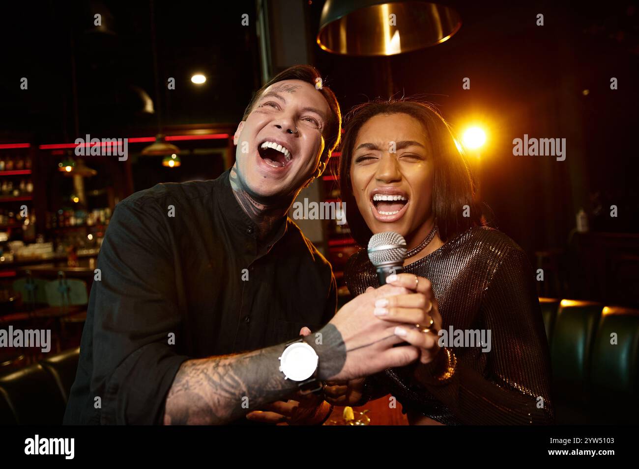 Lively multicultural couple shares a joyful moment on their date while ...