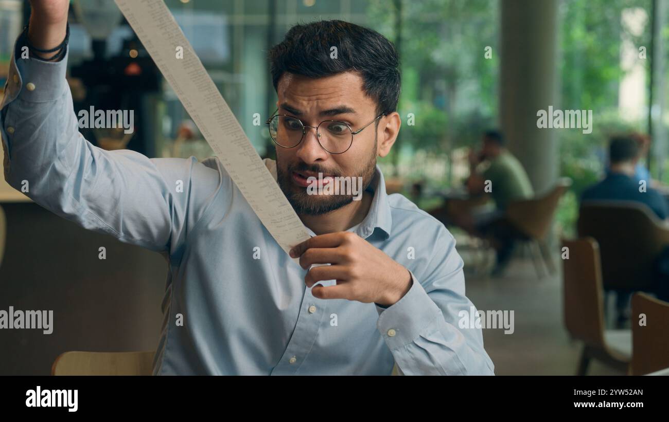 Tired freelance worker male businessman Indian Arabian man stressed ...