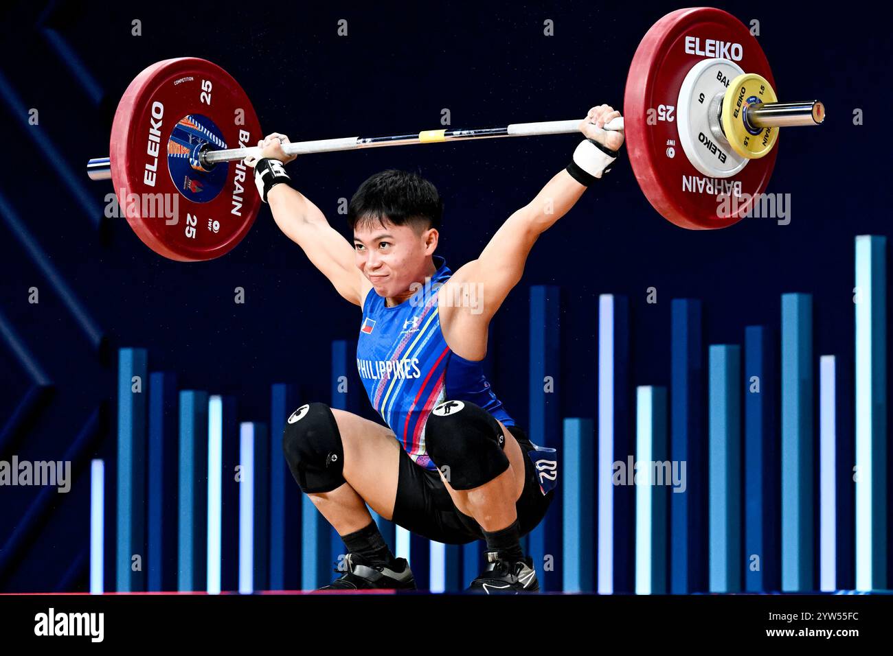 Rosegie Ramos of Philippine competes in snatch, in the 49 kg women ...