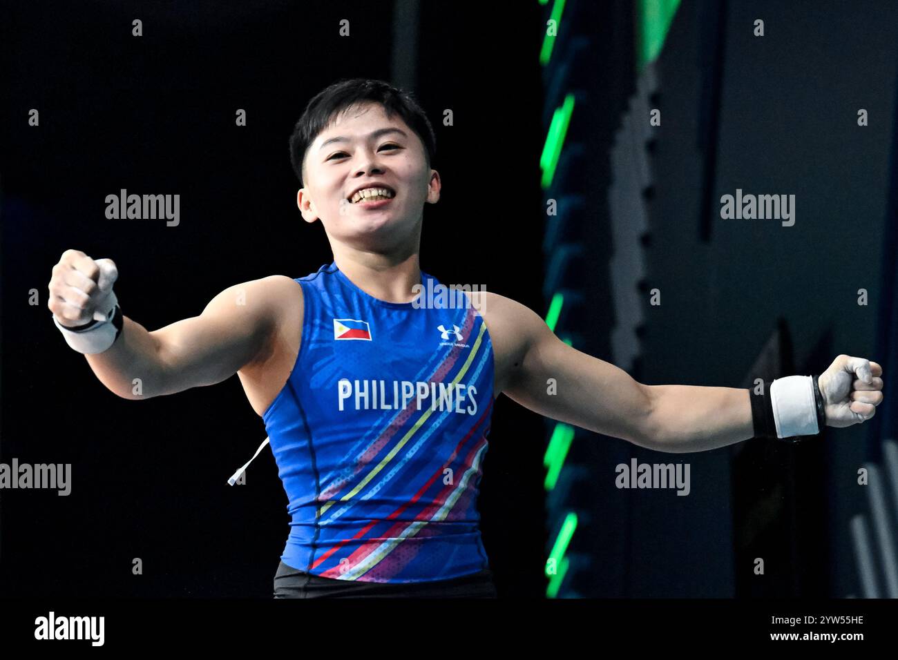 Rosegie Ramos of Philippine reacts after competing in snatch, in the 49 ...