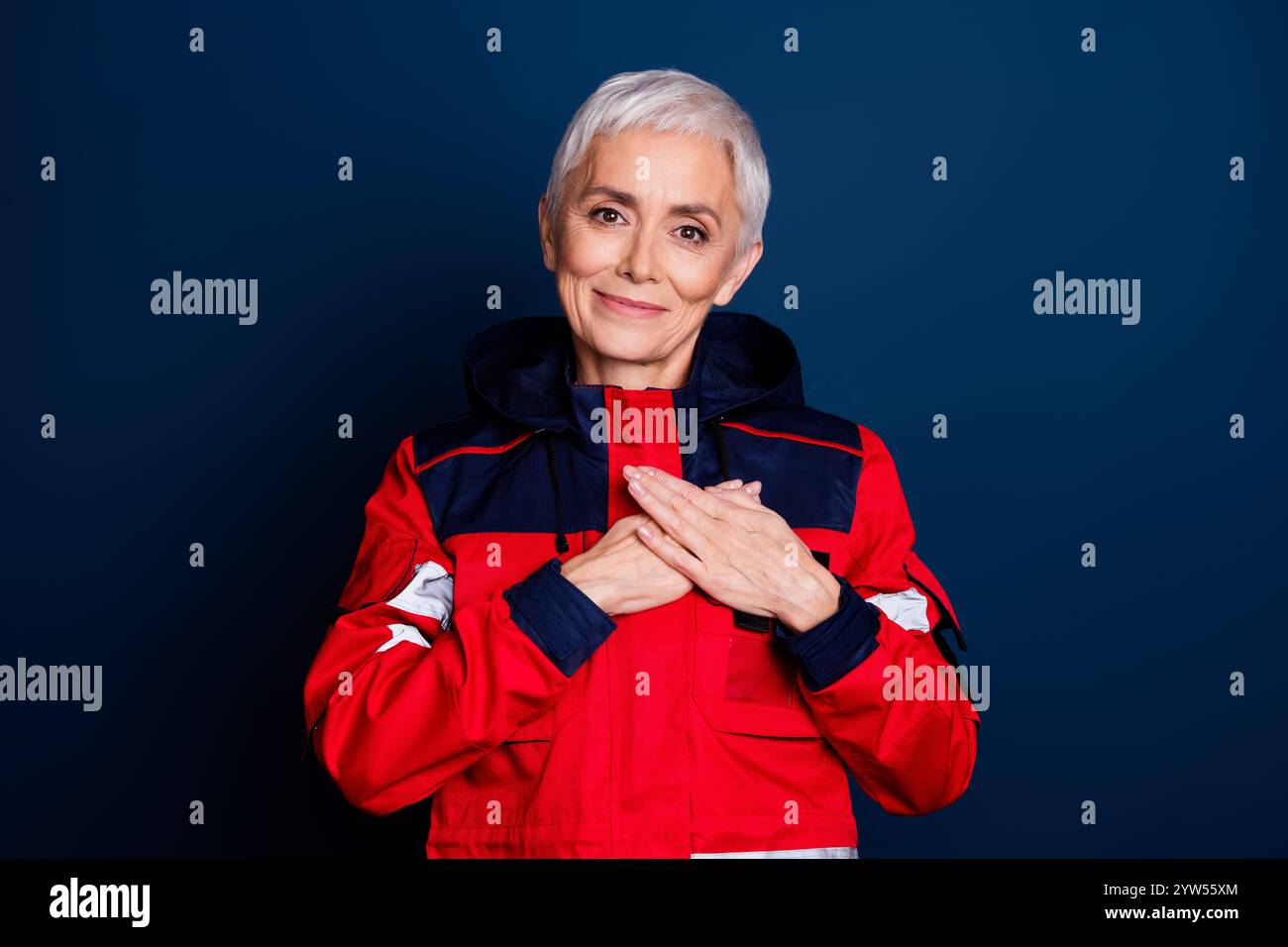Photo of nice senior woman touch chest heart health wear uniform ...
