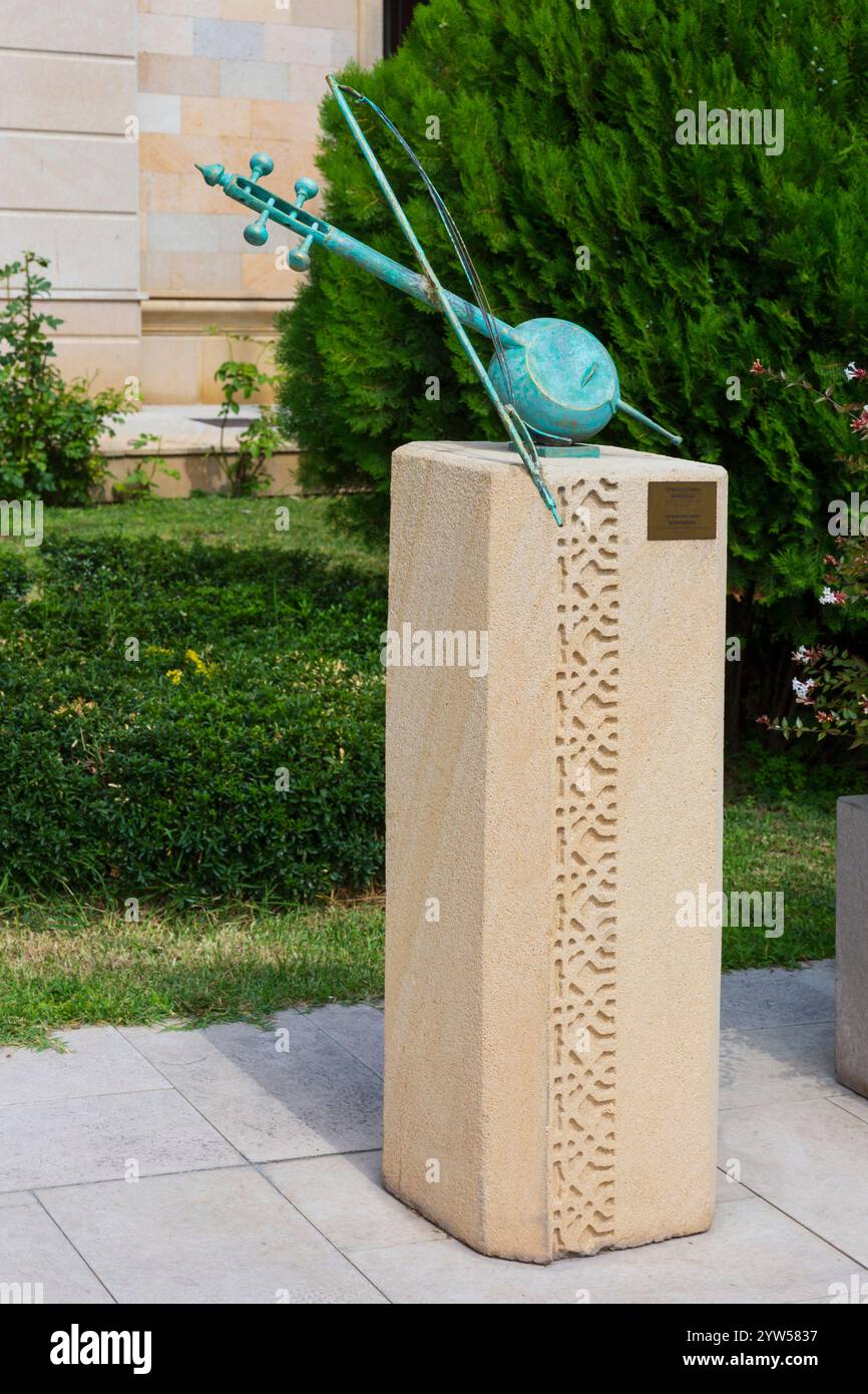 A bronze sculpture by Teymur Rustamov of a traditional Azerbaijani ...