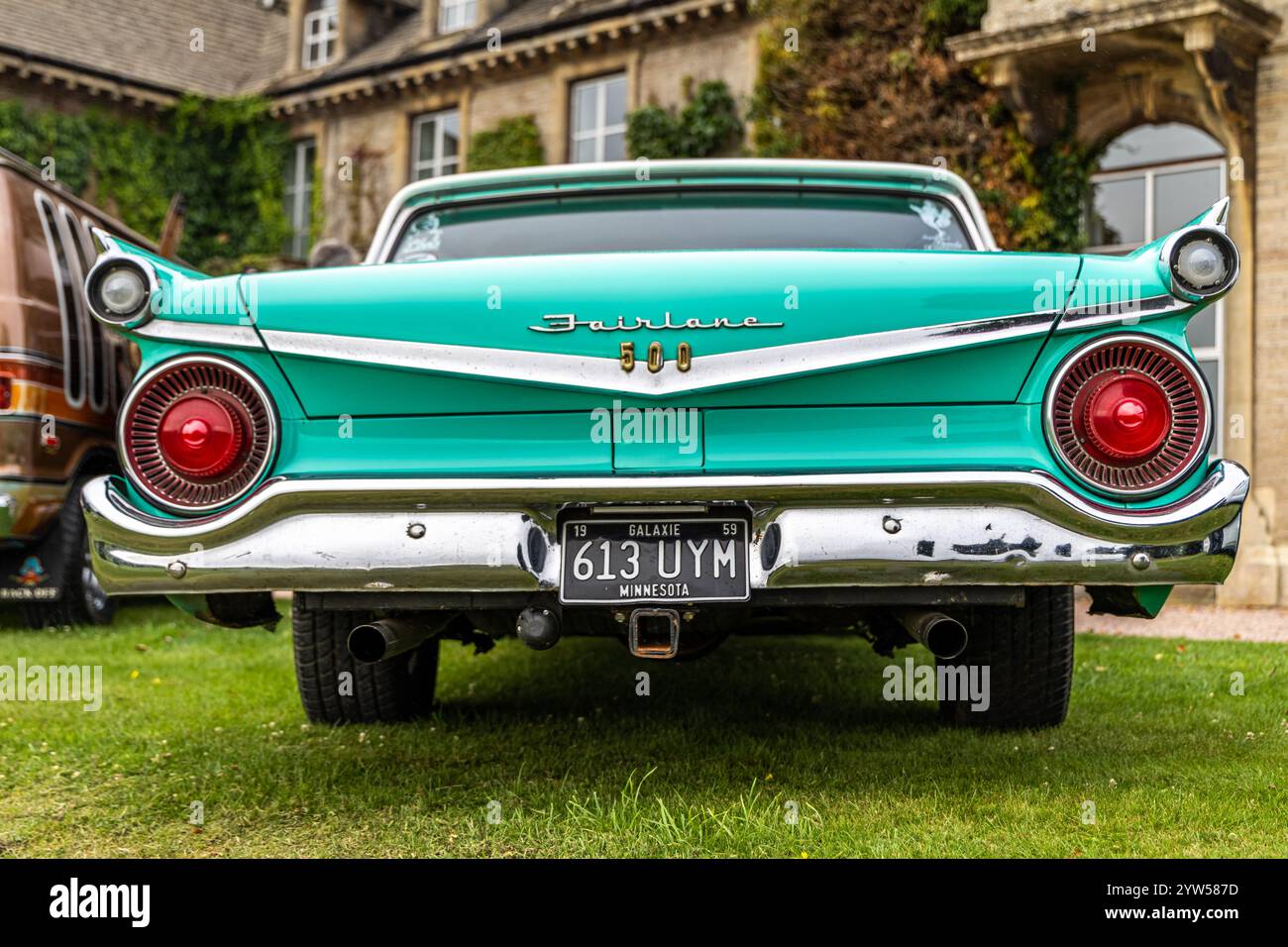 Bristol, UK- August 11, 2024: Rear view of a classic green American ...