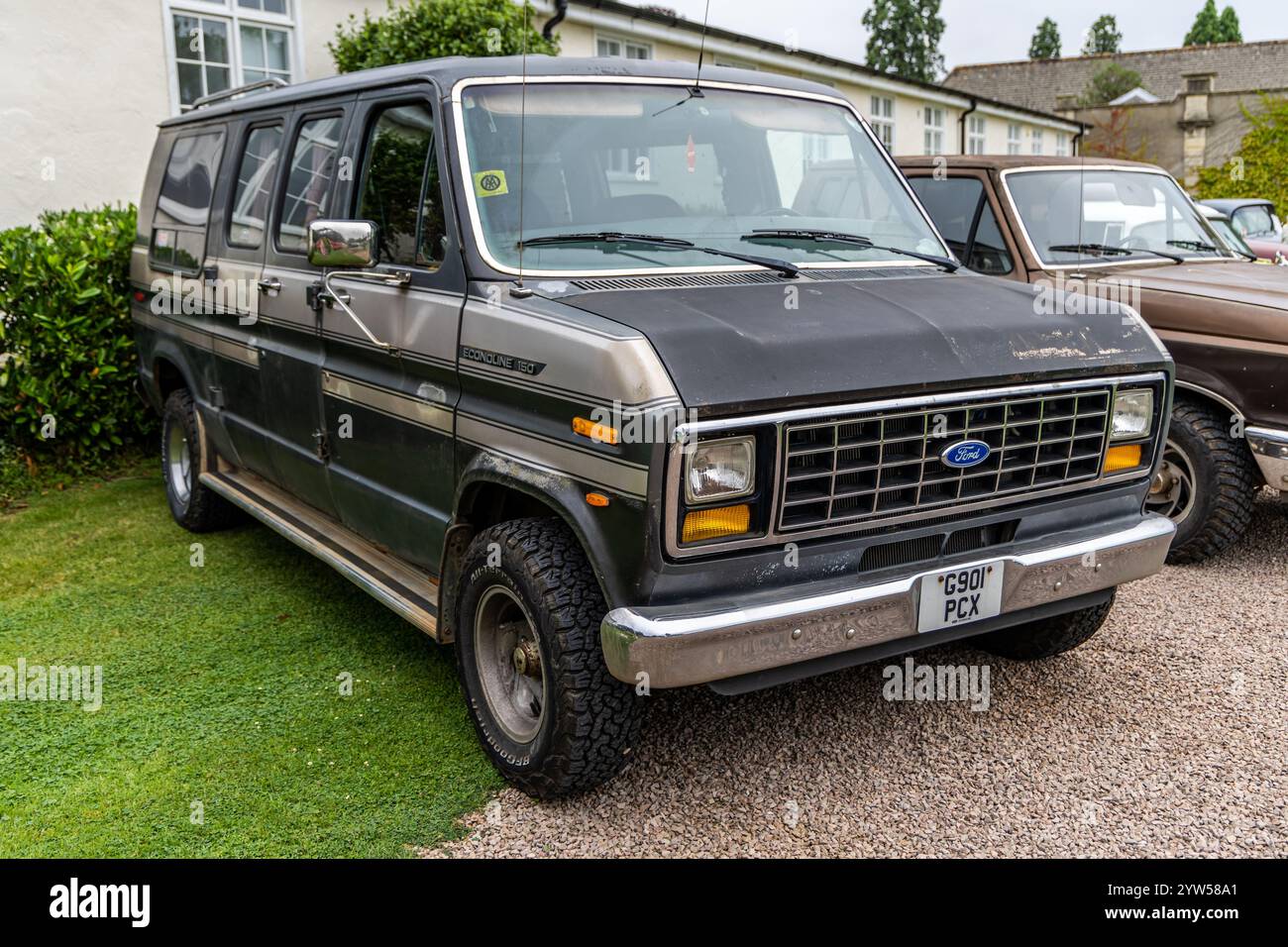 Bristol, UK- August 11, 2024: Front side view of Black Ford Econoline ...