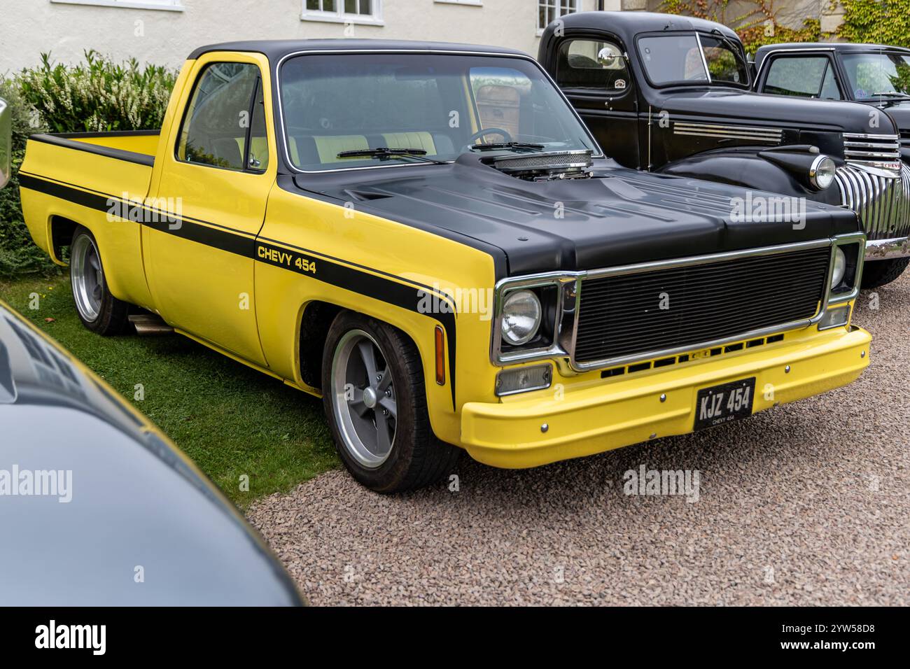 Bristol, UK- August 11, 2024: Yellow 1973 Chevrolet C K pickup truck is ...