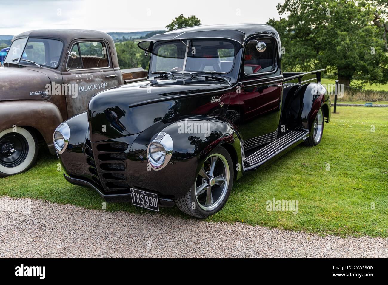 Bristol, UK- August 11, 2024: Black restored 1940 Ford Pickup. A ... Bristol, UK- August 11, 2024: Black restored 1940 Ford Pickup. A ...