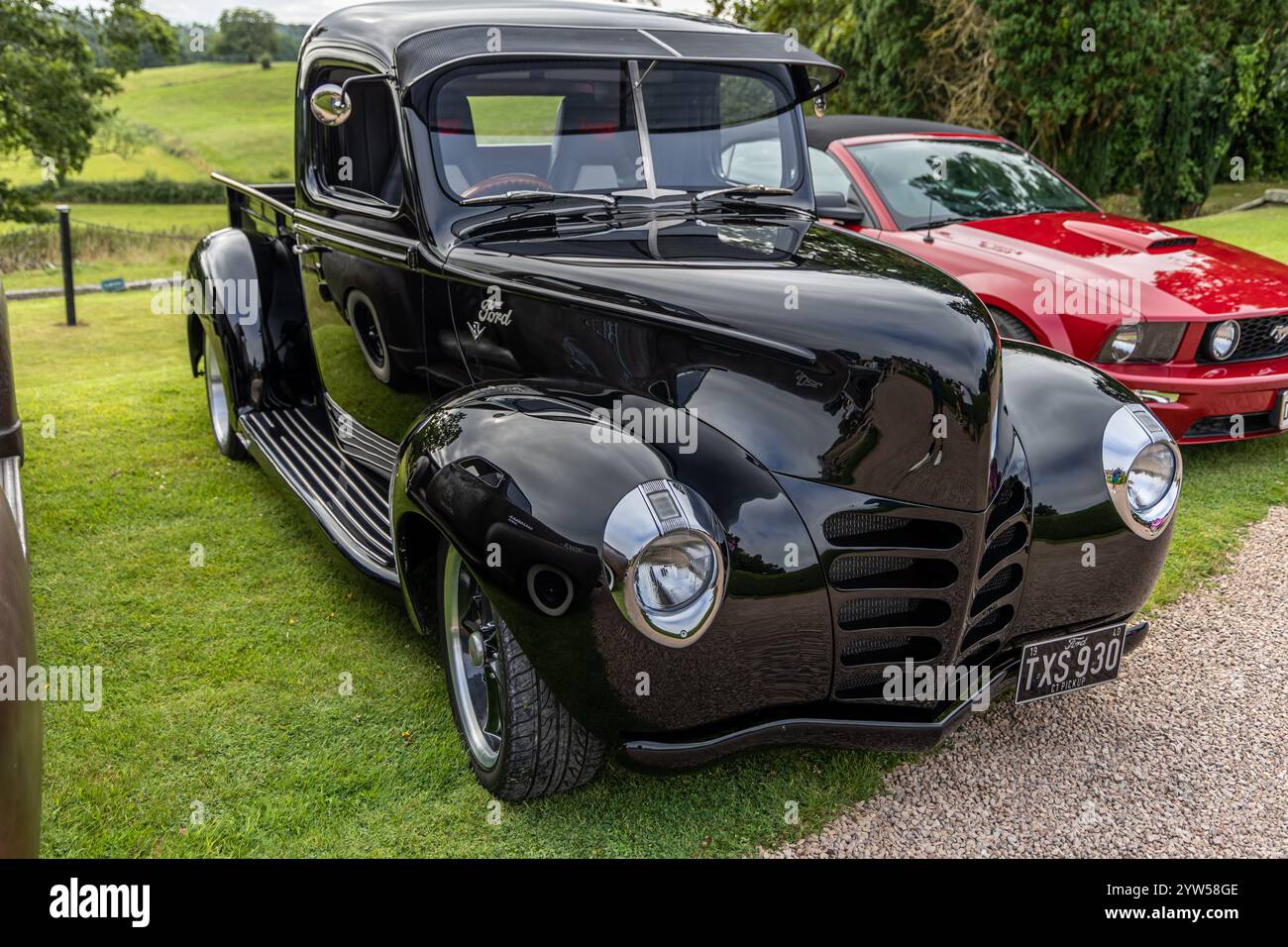 Bristol, UK- August 11, 2024: Black restored 1940 Ford Pickup. A ... Bristol, UK- August 11, 2024: Black restored 1940 Ford Pickup. A ...