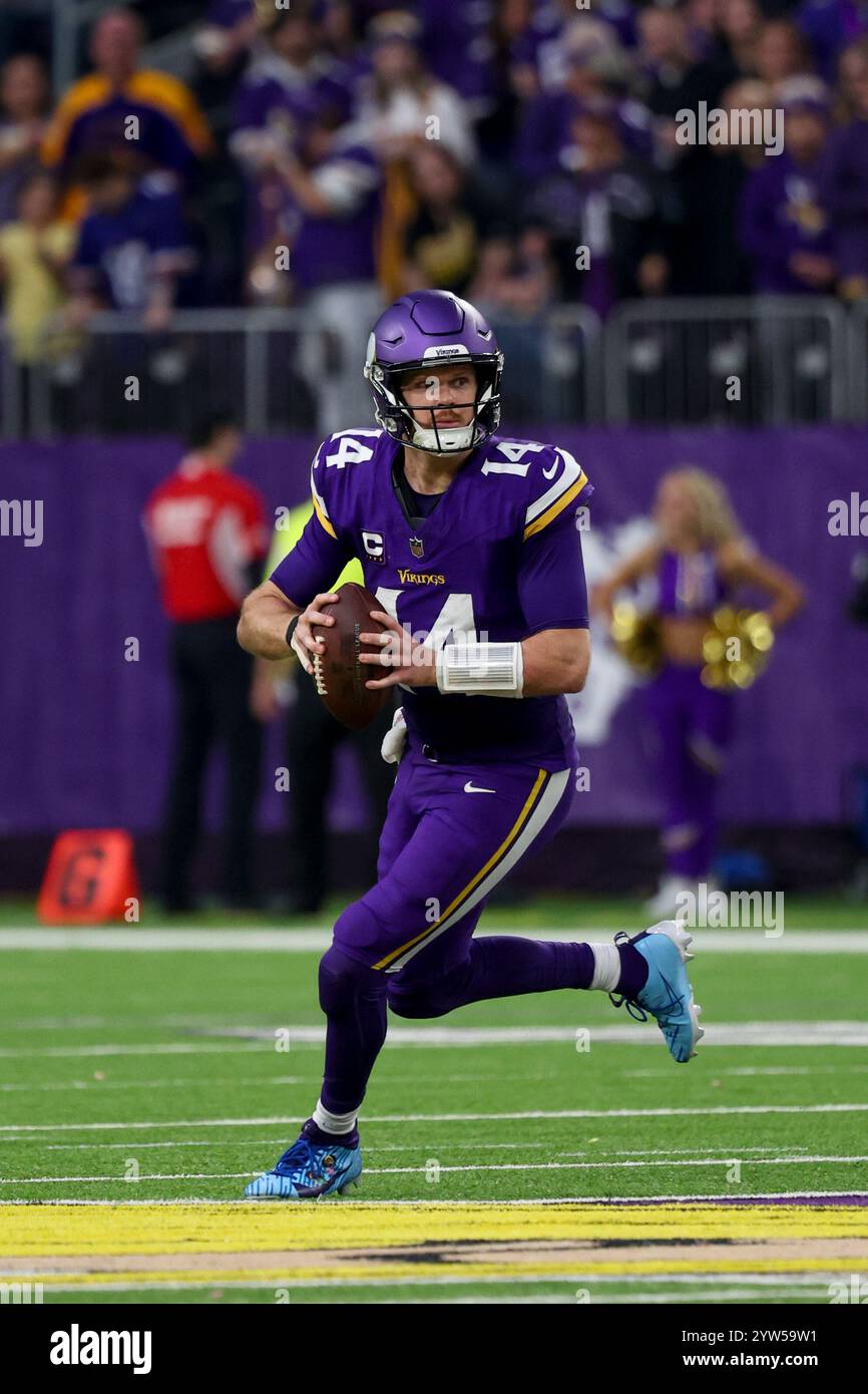 Minnesota Vikings quarterback Sam Darnold looks for a receiver during ...