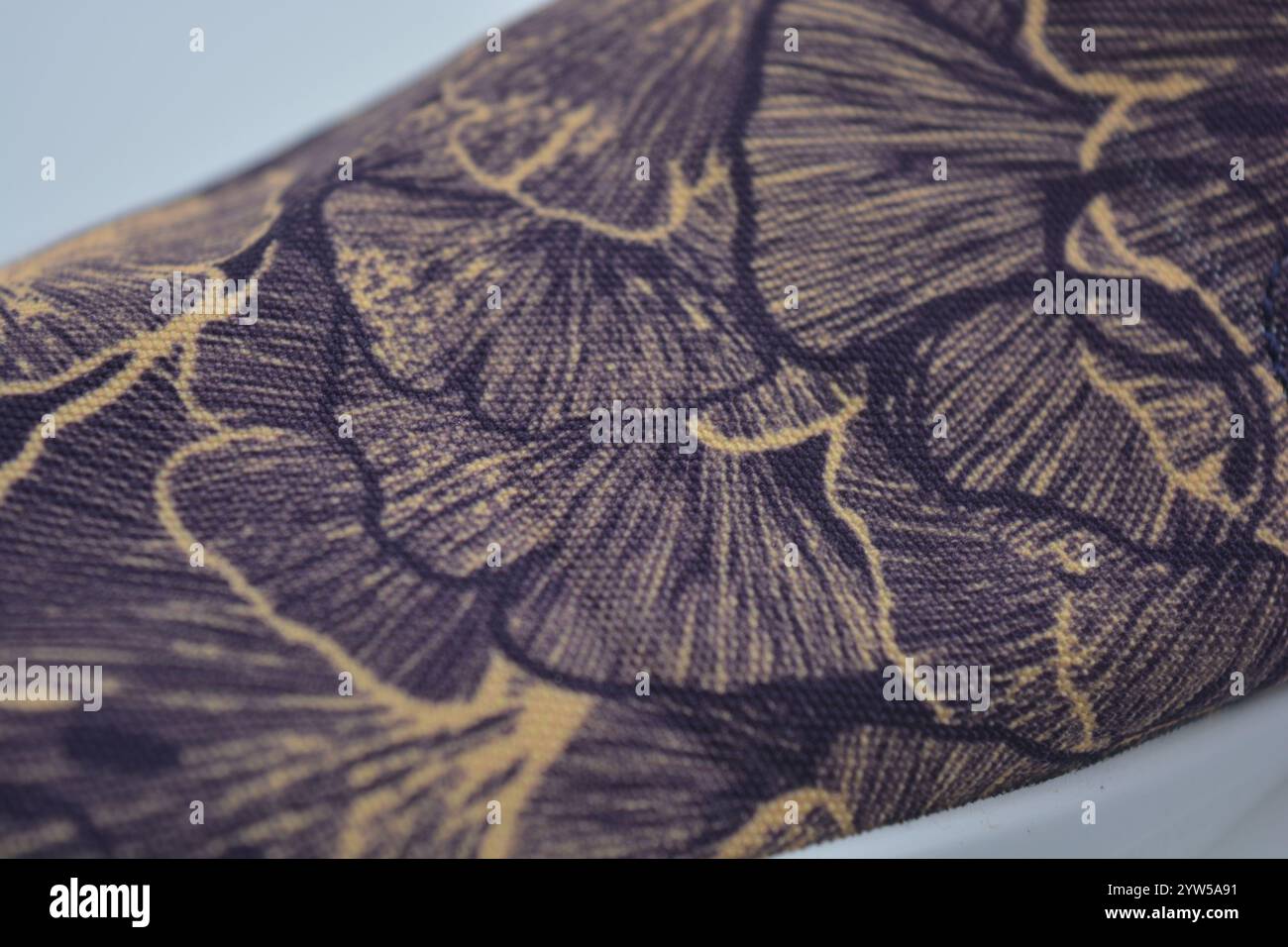 An unusual fabric purple, orange background with a pattern in the form ...