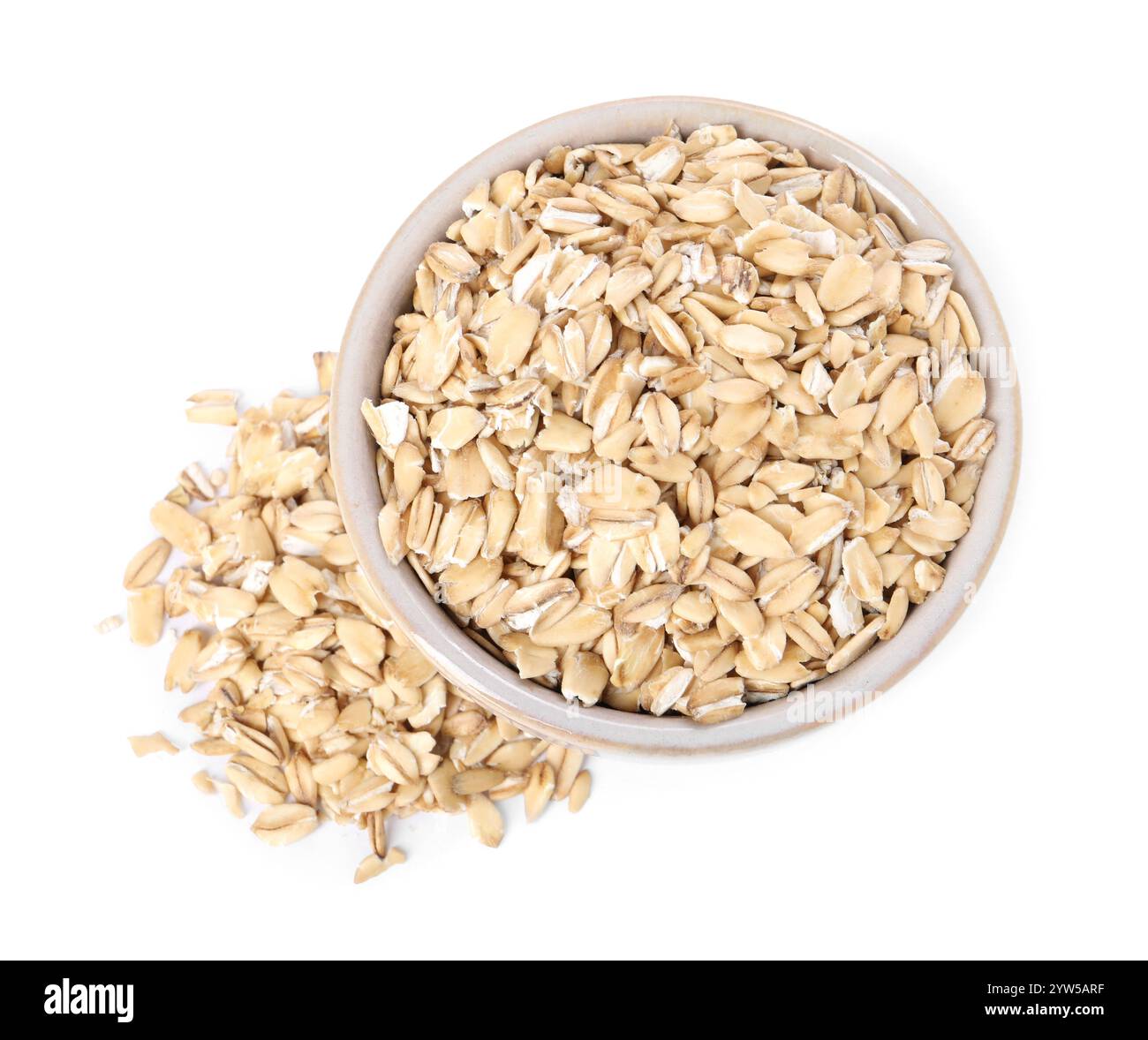 Dry oat flakes in bowl isolated on white, top view Stock Photo - Alamy