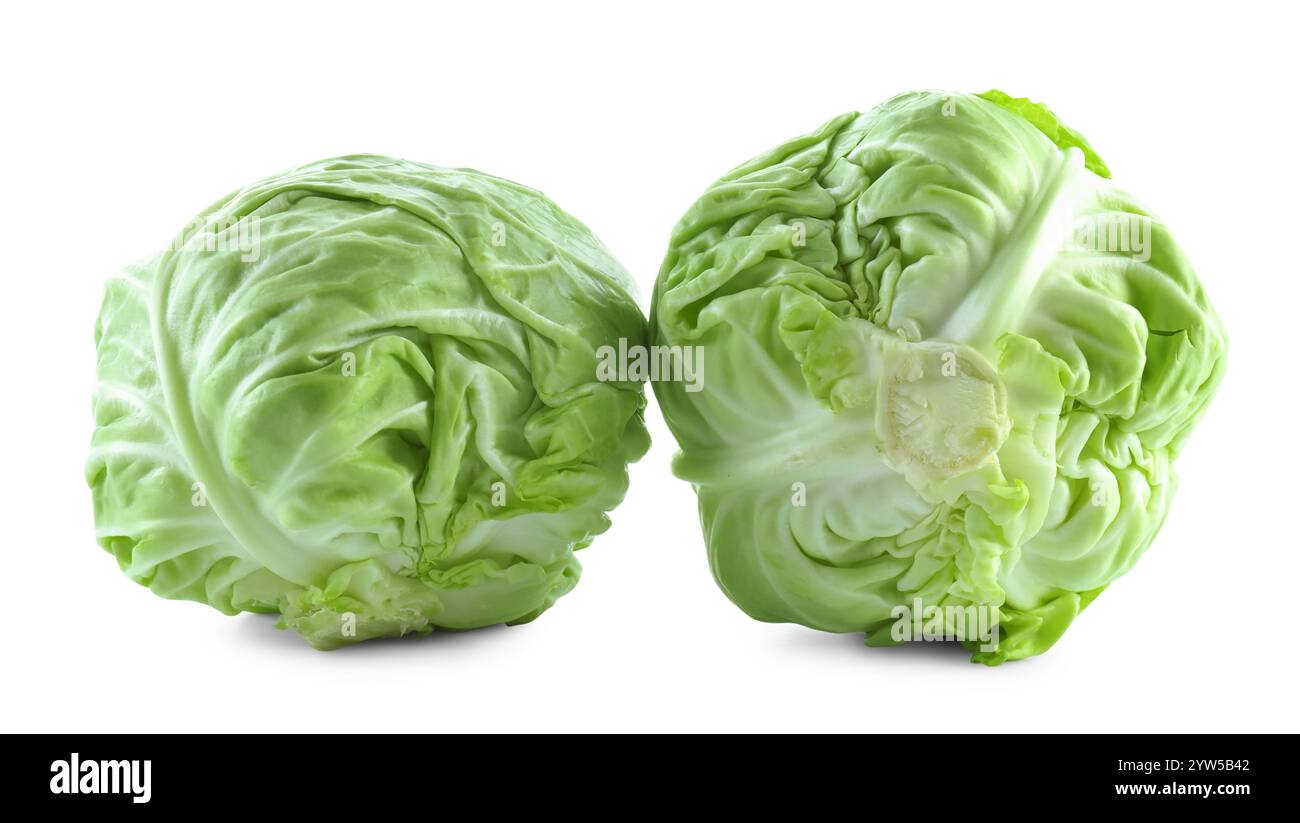 Two whole heads of cabbage isolated on white Stock Photo - Alamy