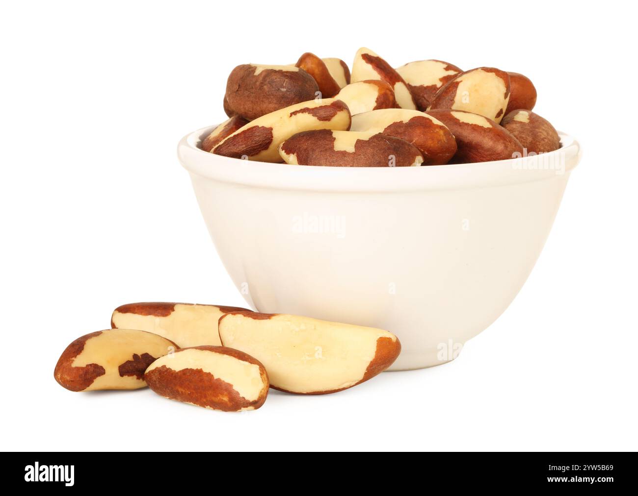 Tasty Brazil nuts in bowl isolated on white Stock Photo - Alamy
