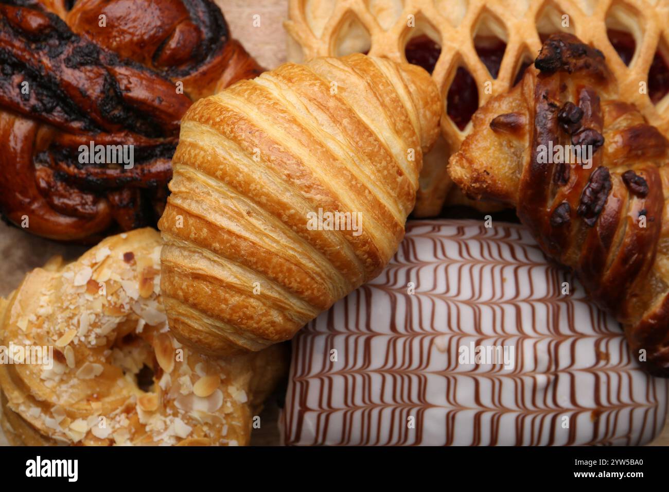 Different sweet pastries on table, top view Stock Photo - Alamy